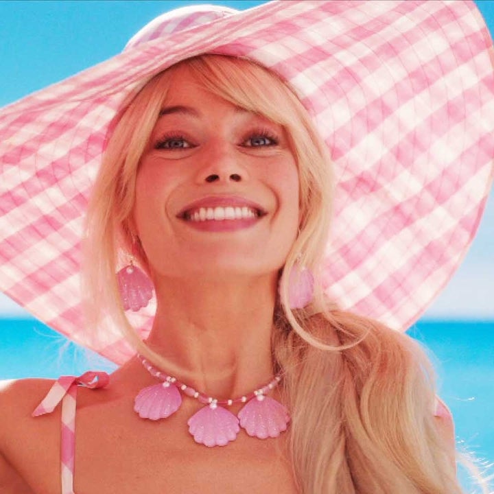Margot Robbie Sheds Her Barbie Pink For Chic Beige Swimsuit While 0036